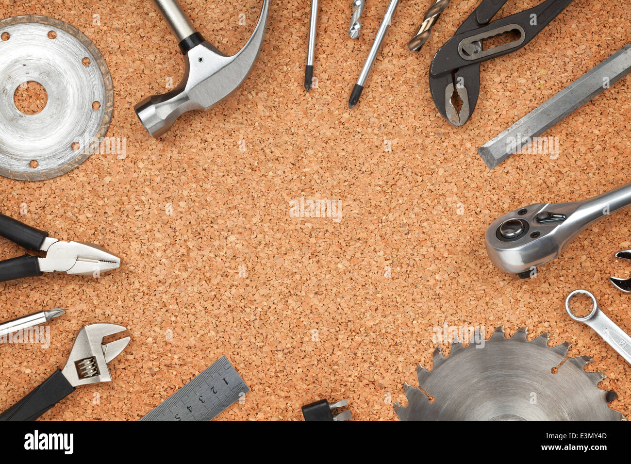 Set of tools on cork panel background with copy space Stock Photo - Alamy