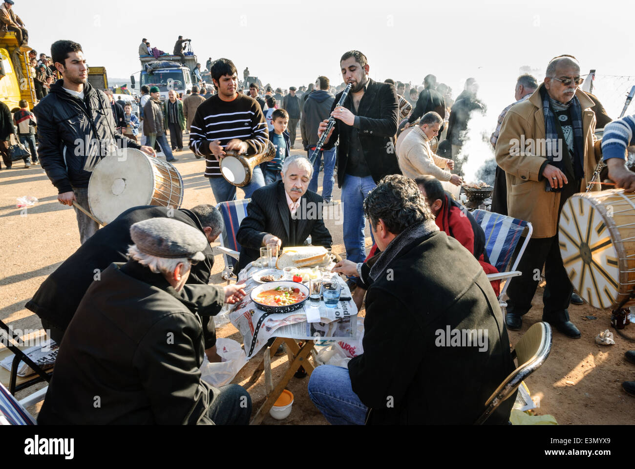 Spectators of the camel wrestling league enjoying the party, Ayvalik ...