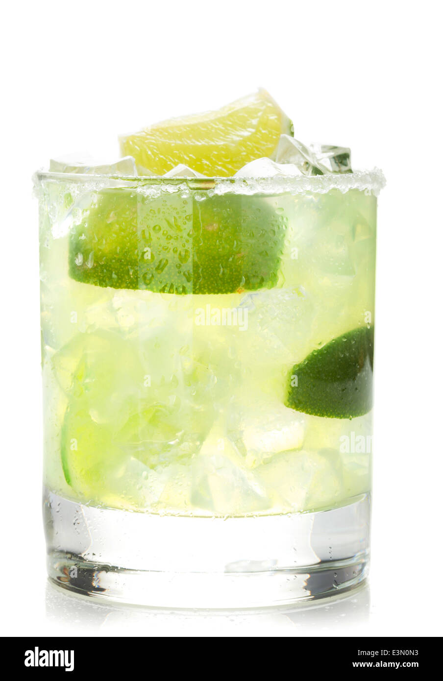 Classic margarita cocktail with salty rim. Isolated on white background ...