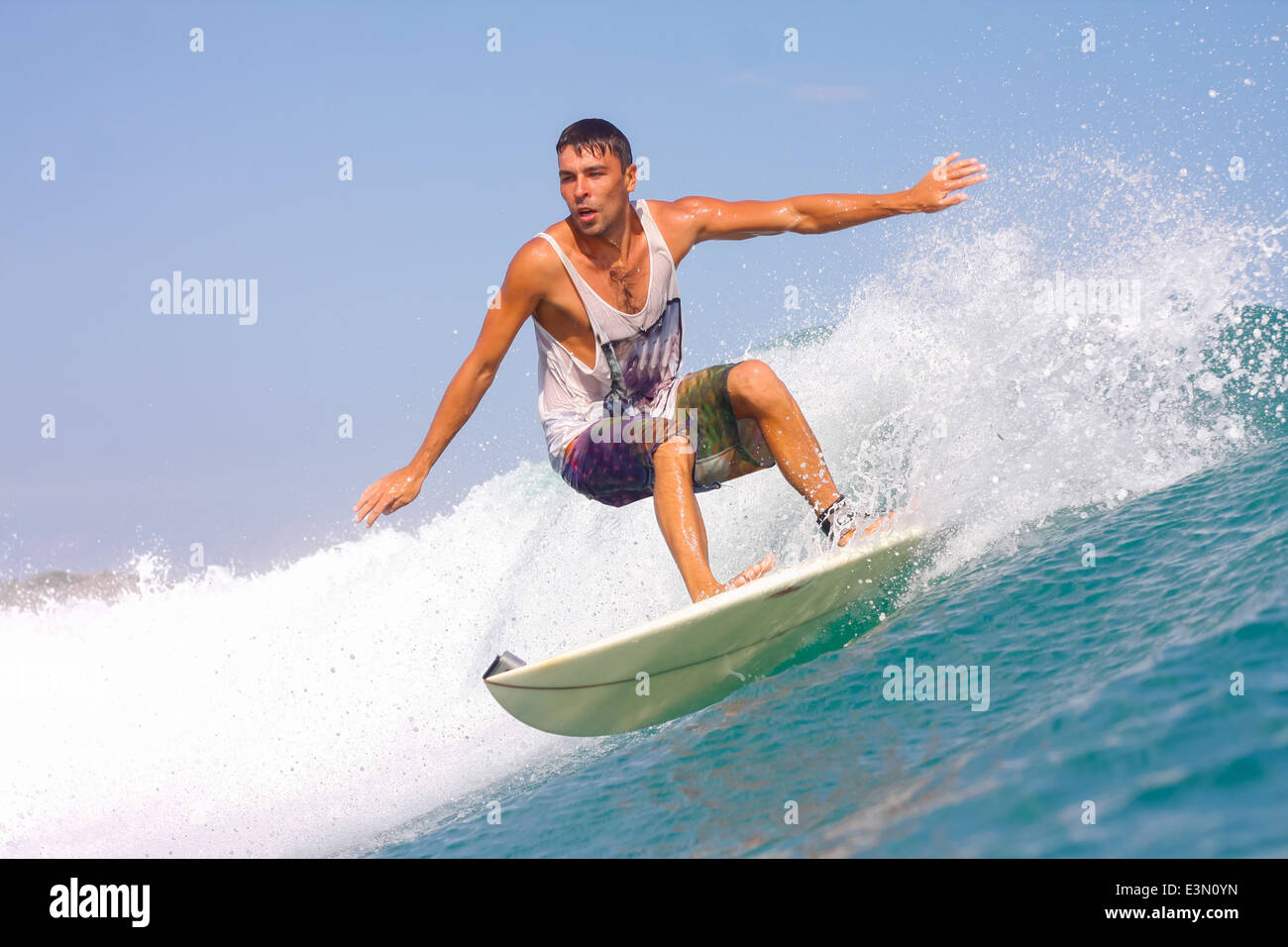 Surfing a wave.Indonesia Stock Photo - Alamy