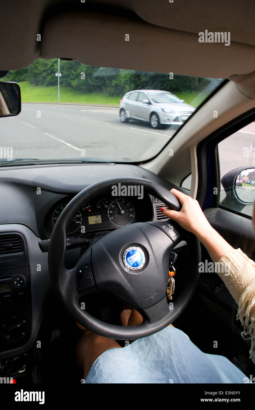 Young girl driving Fiat car Stock Photo - Alamy