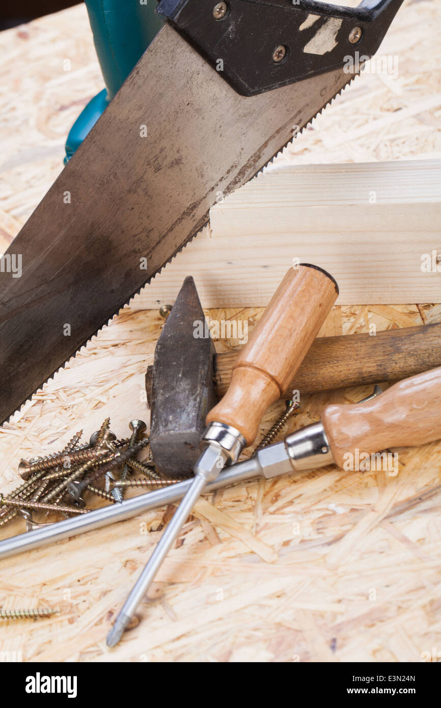 Battery-operated portable hand drill with timber, screwdrivers and ...