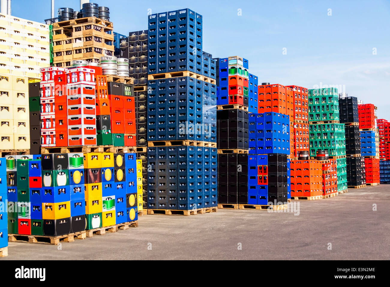 Several stacks of colorful beverage bottle crates outdoors Stock Photo ...