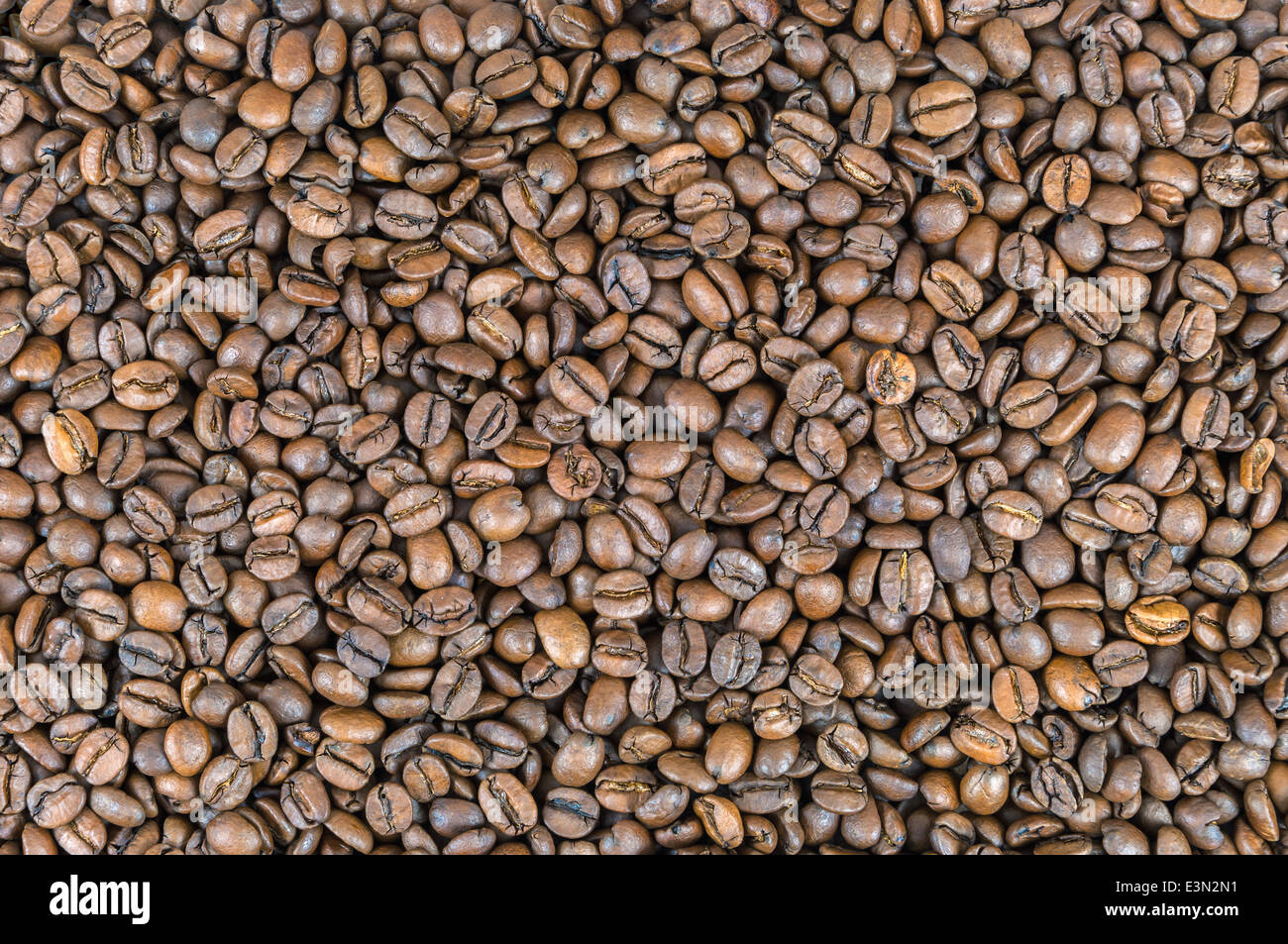 Closeup of coffee beans texture for background Stock Photo - Alamy