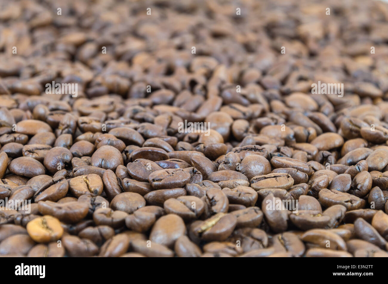 Closeup of coffee beans texture for background Stock Photo - Alamy