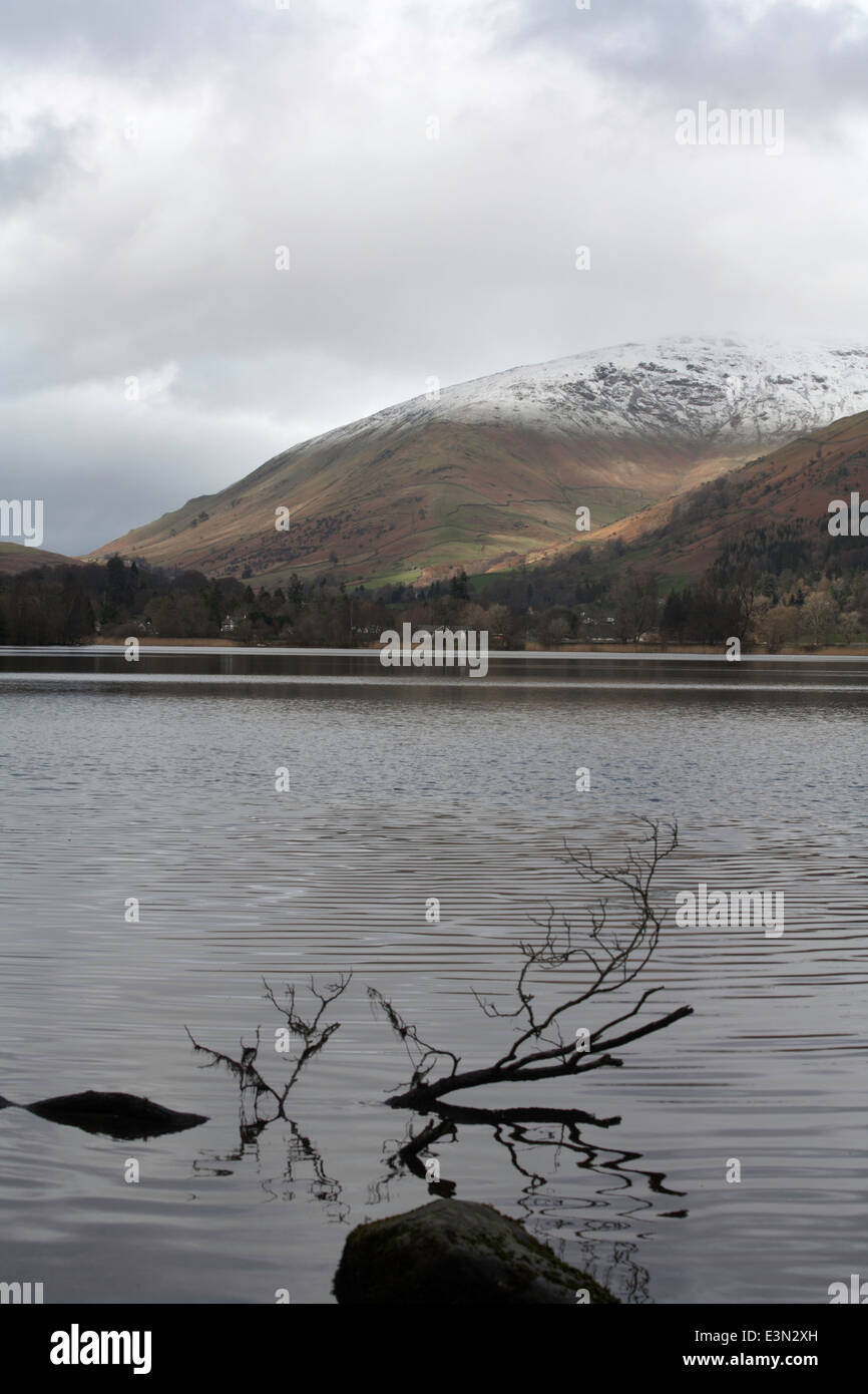 Storm passing over the snow covered summit of Seat Sandal viewed from ...