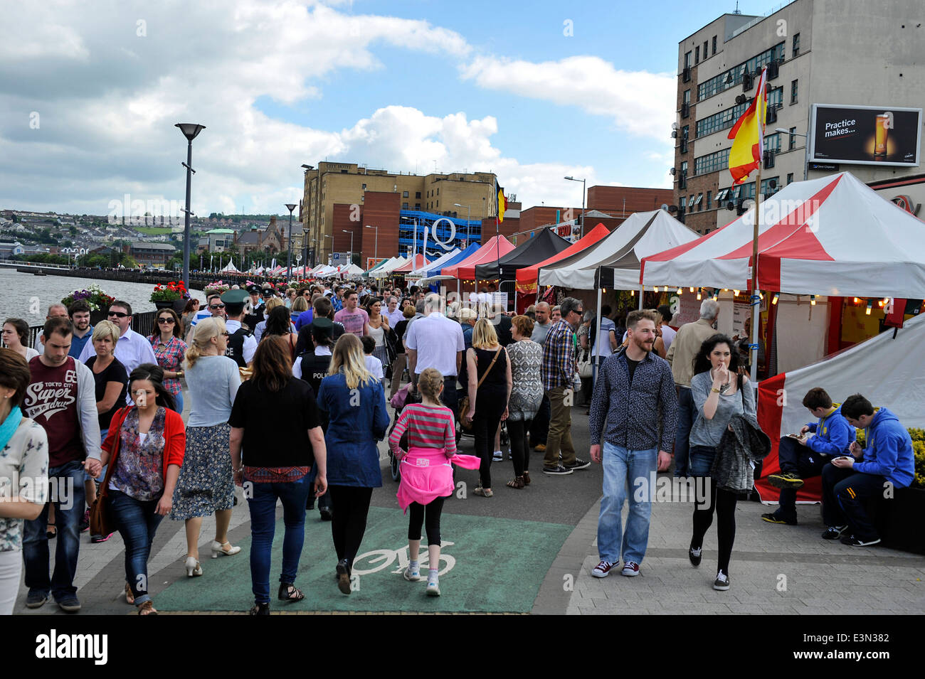 Crowds of people visit the outdoor markets on Queens Quay, Derry ...