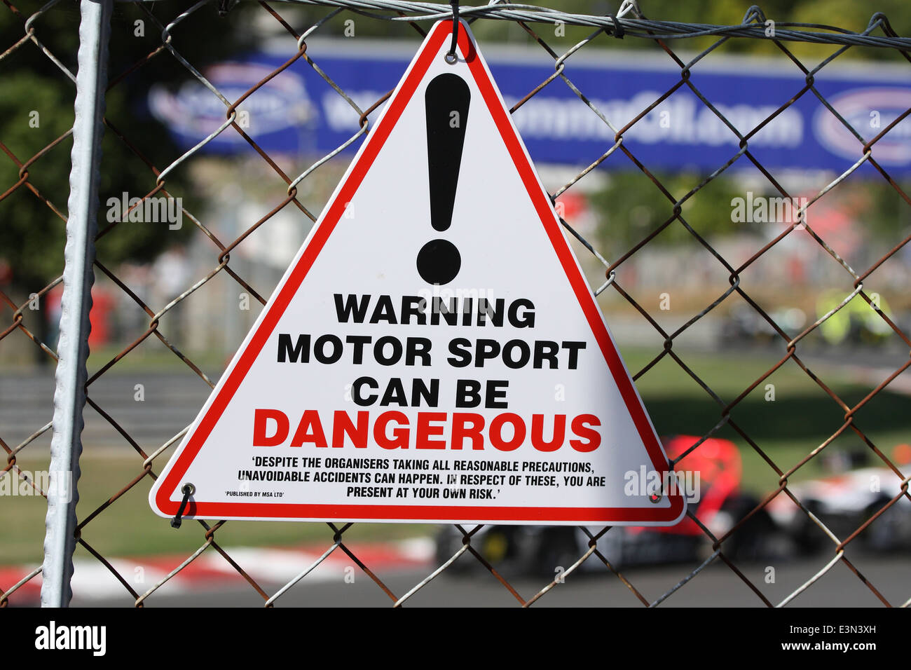 'Motorsport can be dangerous' warning sign Stock Photo - Alamy