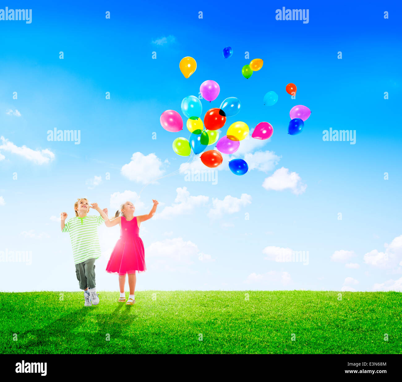 Cheerful Children Playing Balloons Outdoors Stock Photo - Alamy