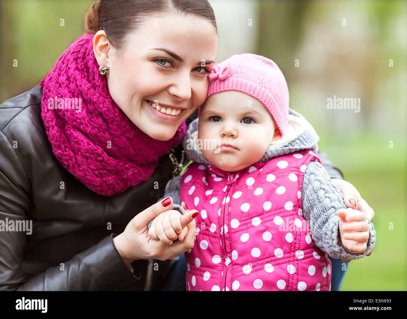 Mother and baby in spring park portrait Stock Photo - Alamy