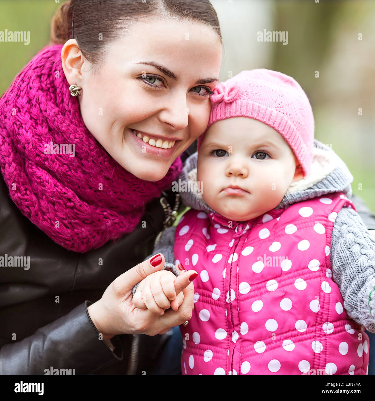 Mother and baby in spring park portrait Stock Photo - Alamy