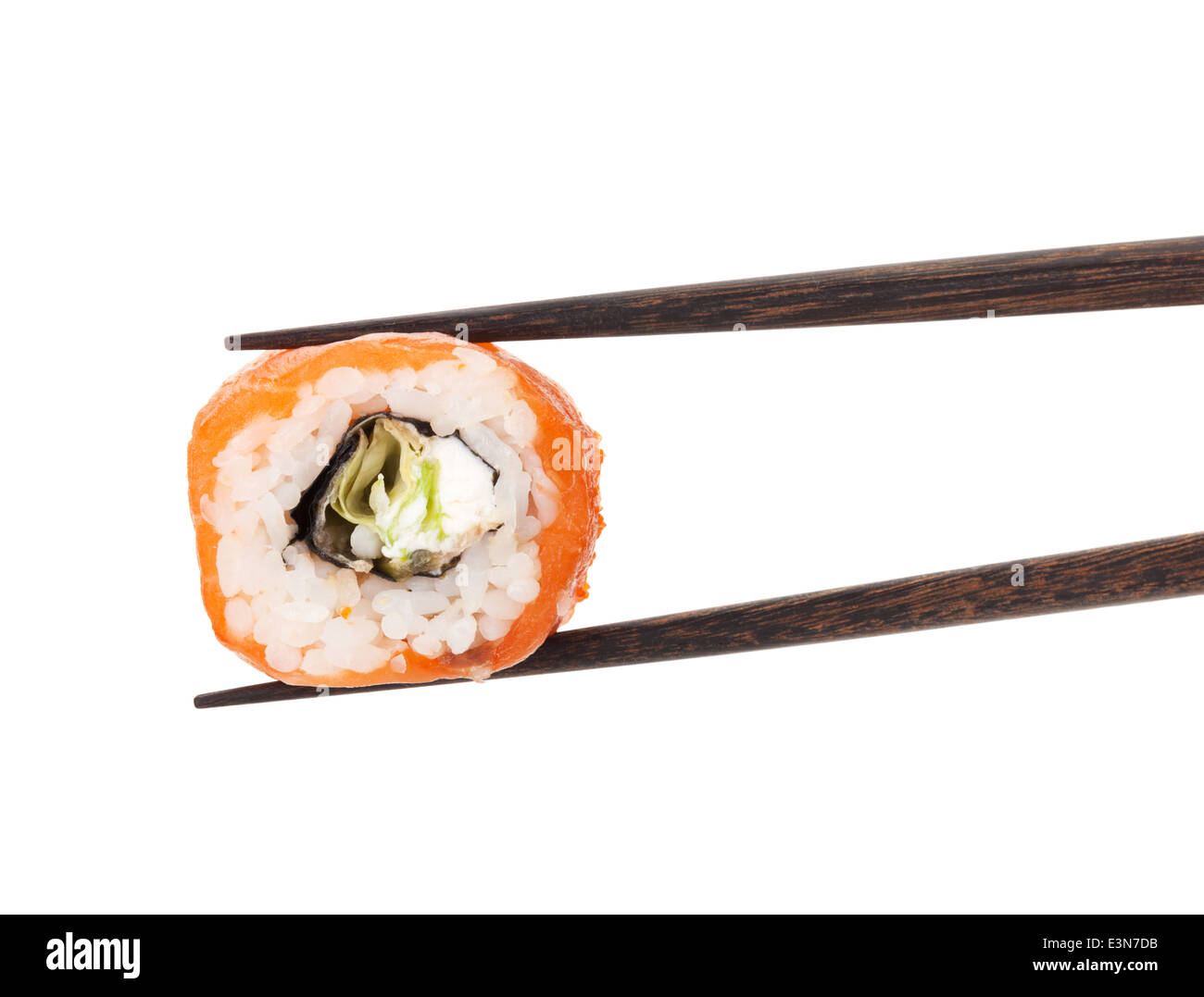 Sushi maki in chopsticks. Isolated on white background Stock Photo - Alamy