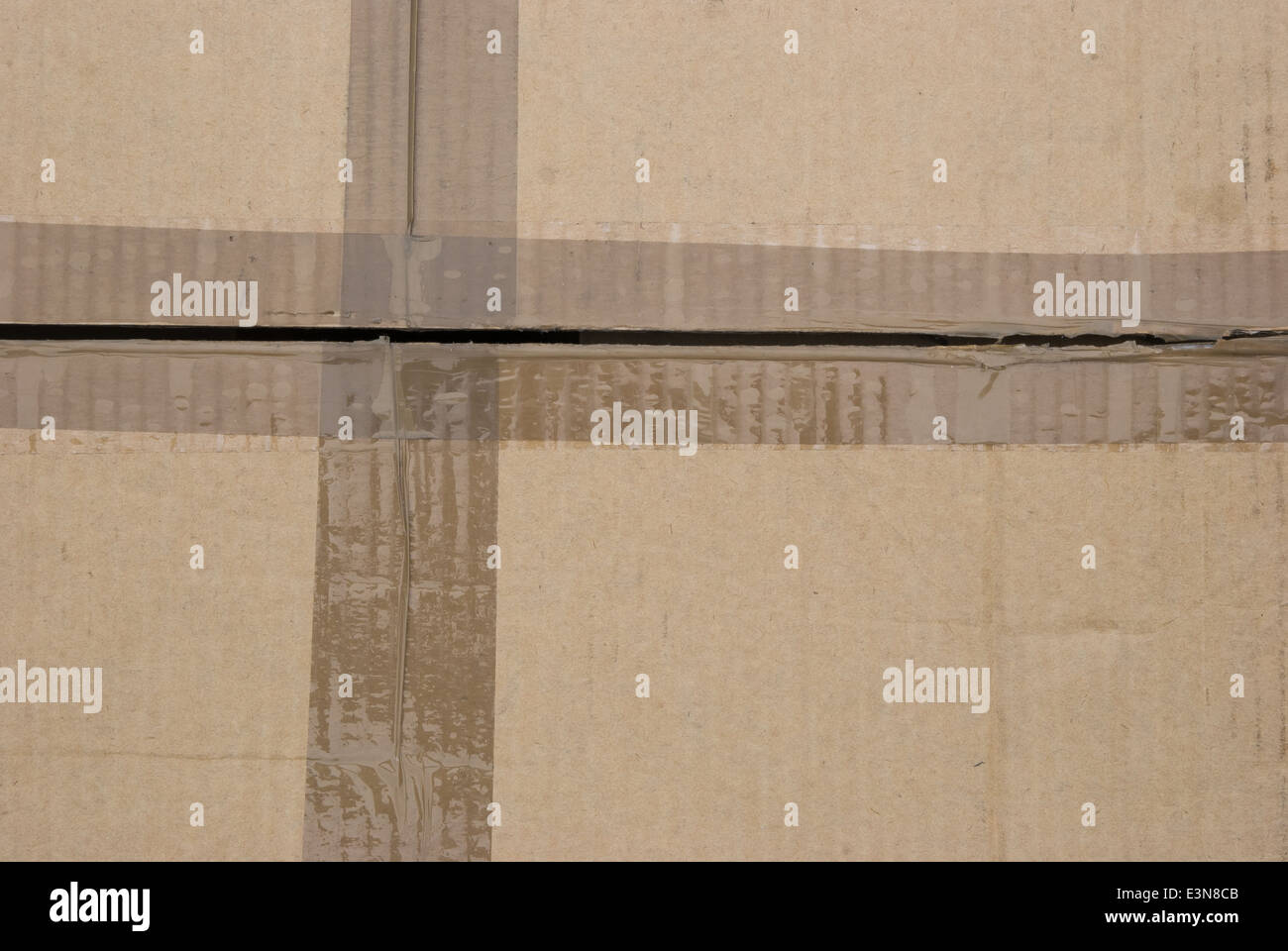 carton stuck with tape Stock Photo - Alamy