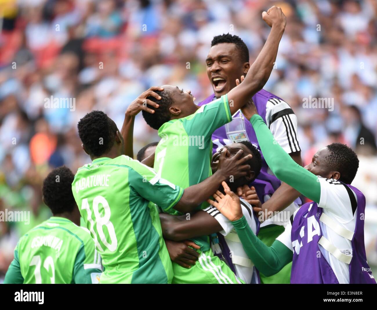 Porto Alegre, Brazil. 25th June, 2014. Nigeria's Ahmed Musa (C ...