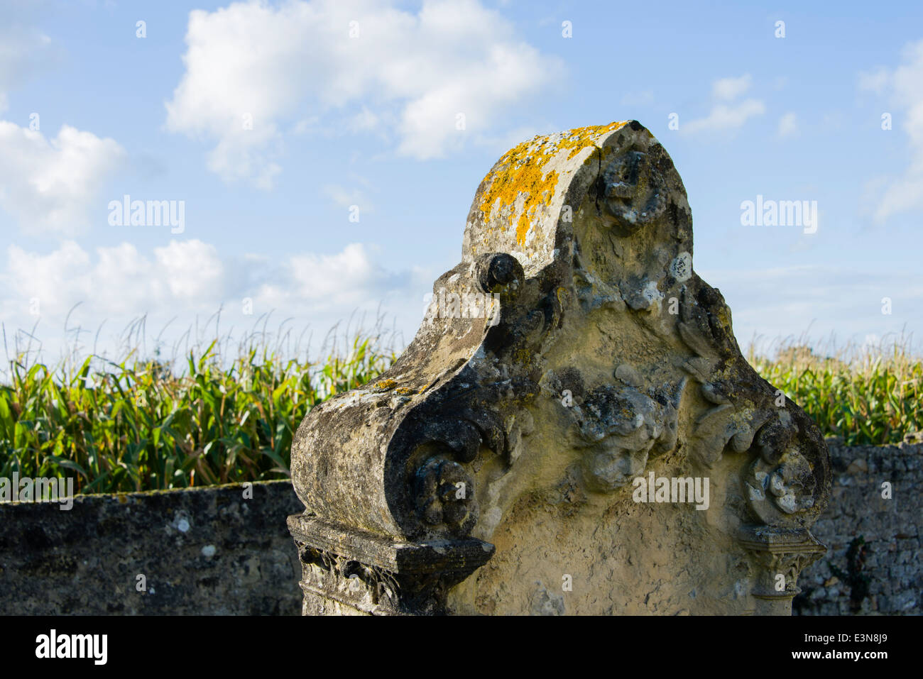 Cemetery and tombstone at Colleville-sur-Mer church of Notre-Dame with ...