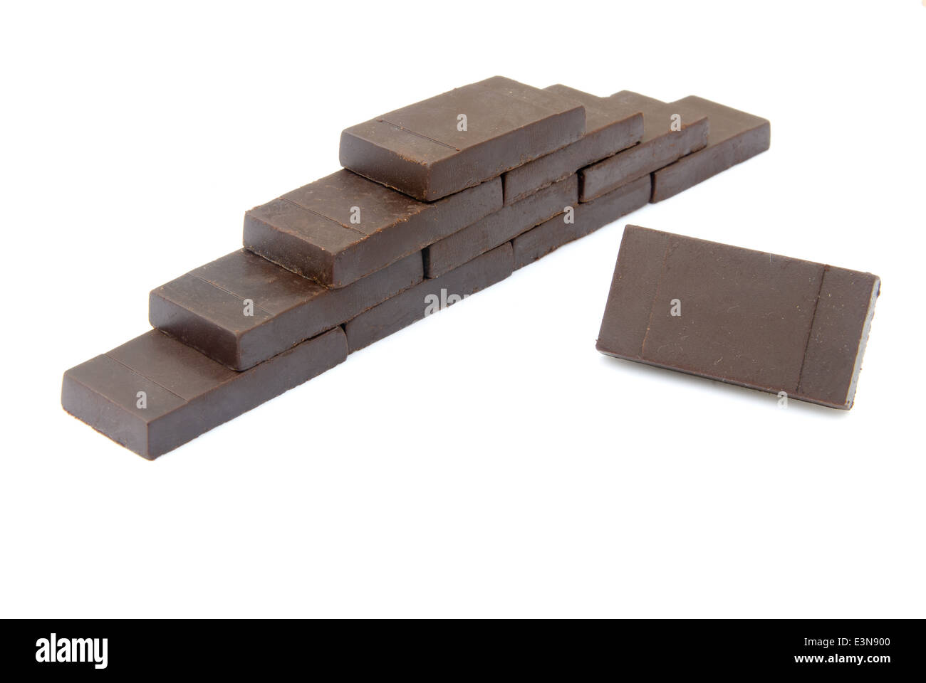 chocolate blocks on white background Stock Photo - Alamy