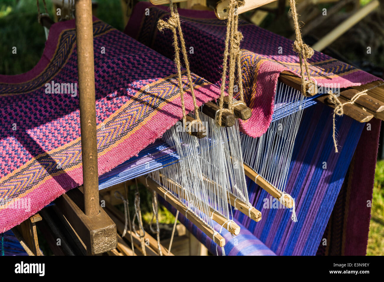 Vertical photo of rug hand-loom on display in the course of the 4th ...