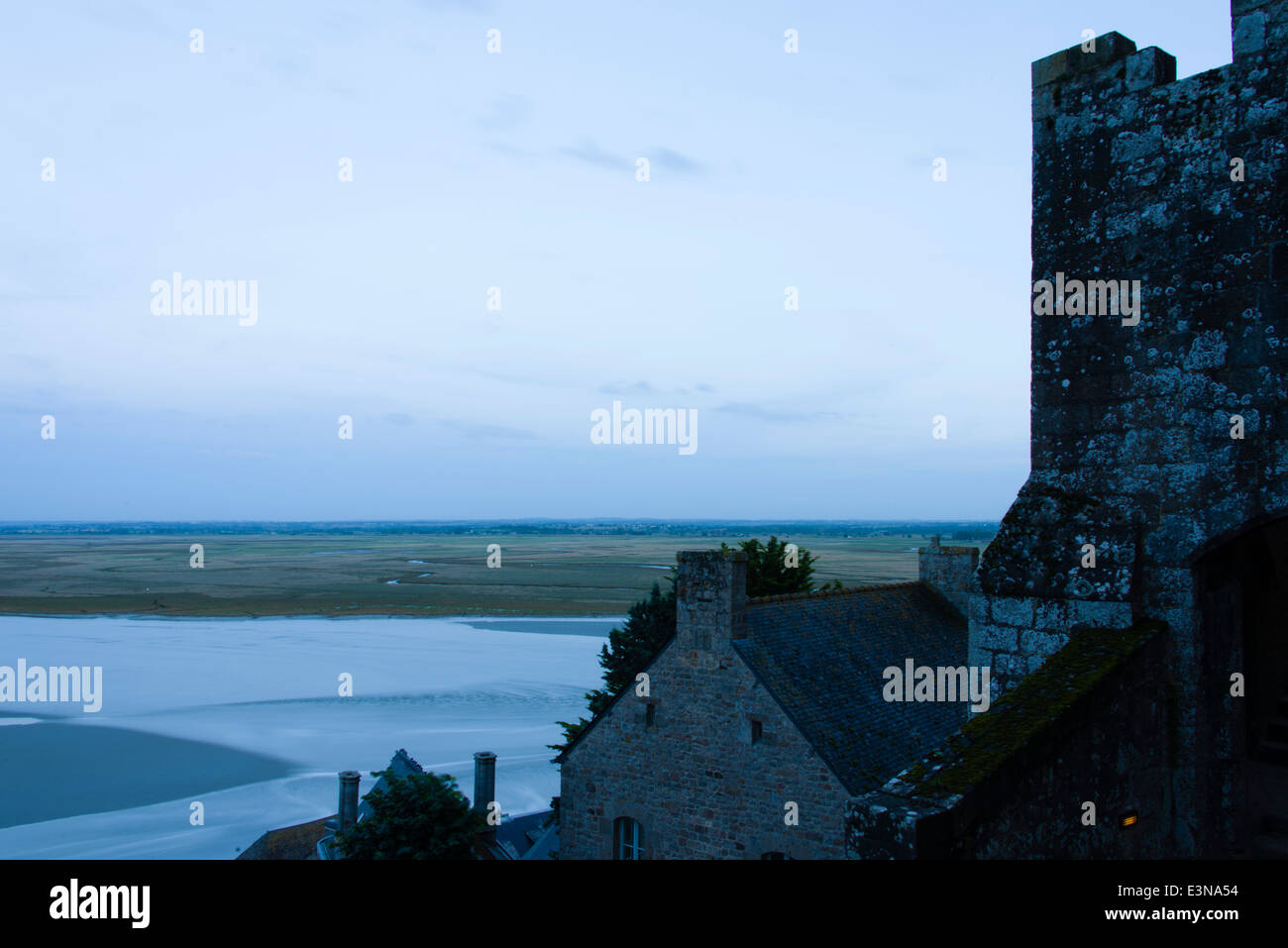 Rising tide surrounds Mont Saint Michel, France Stock Photo - Alamy