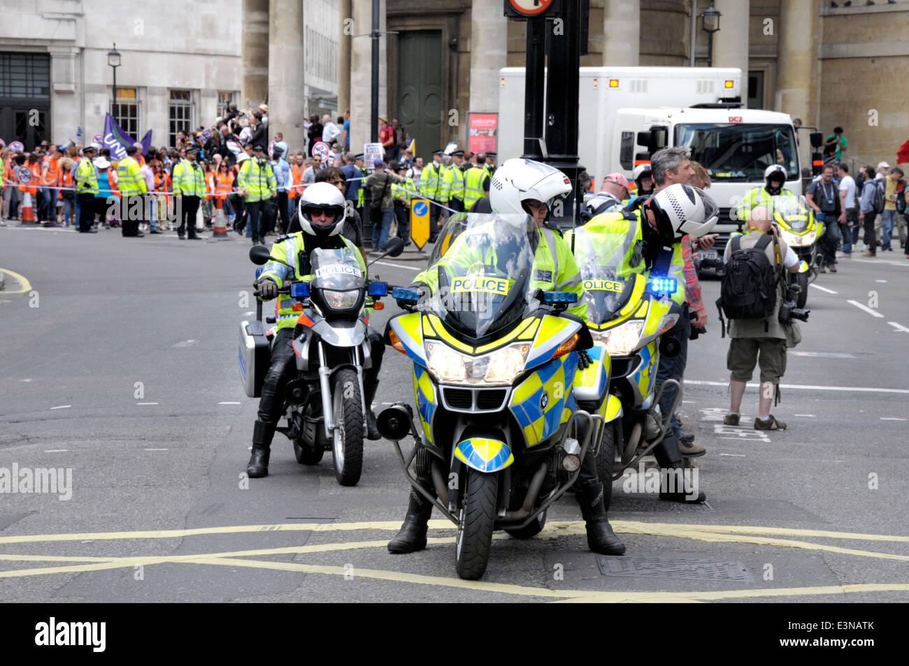 London, England, UK. Motorcycle police officers at the head of a large ...