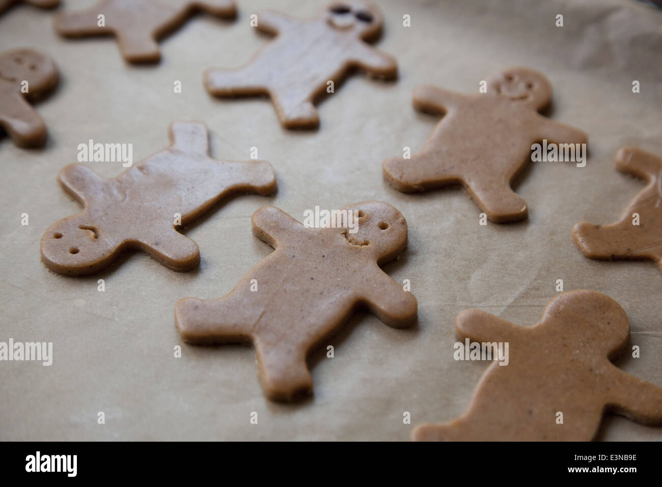 Gingerbread cookies on baking sheet Stock Photo - Alamy