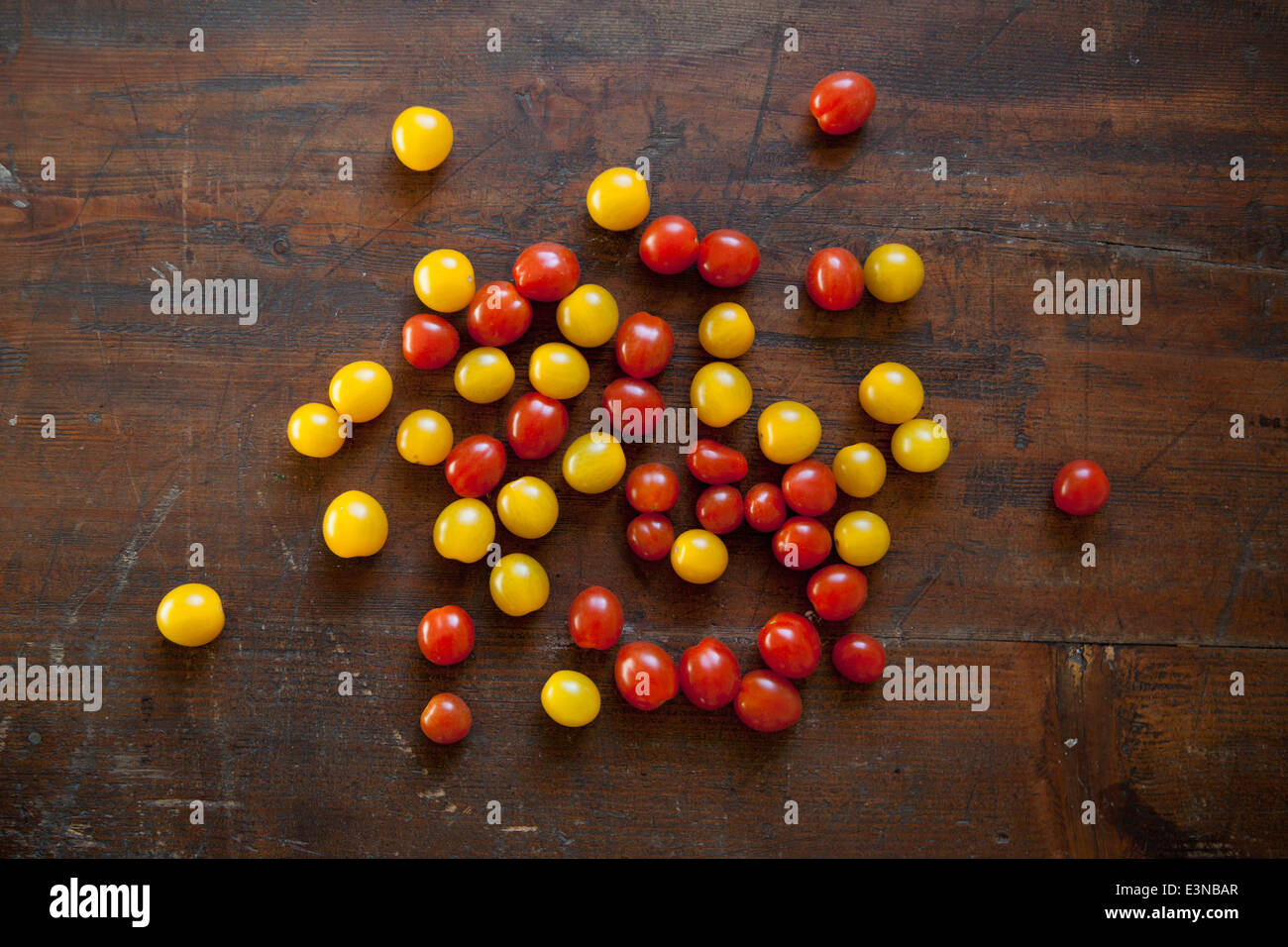 Cherry tomatoes on colored hi-res stock photography and images - Alamy