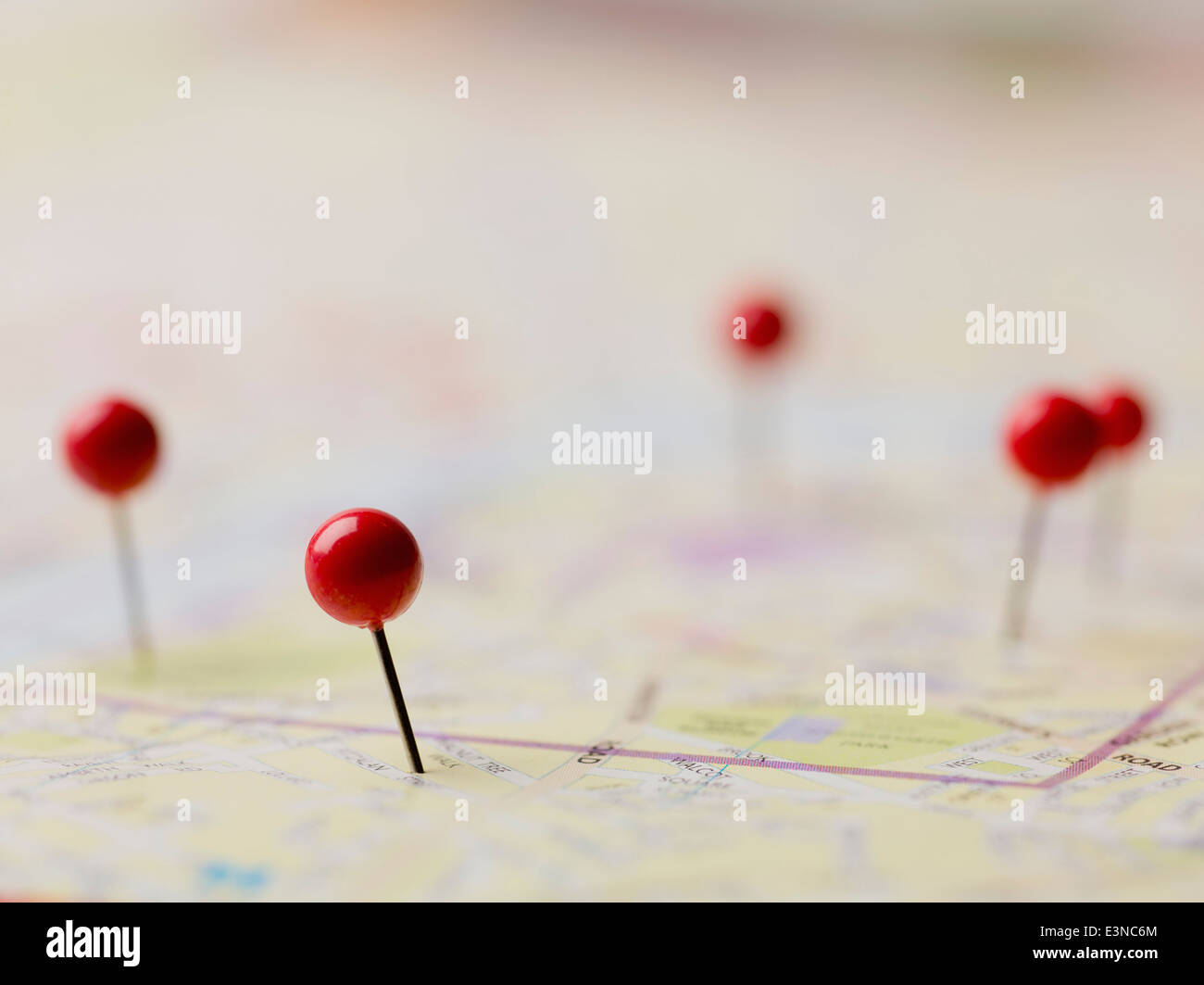 Red thumbtacks on map Stock Photo - Alamy