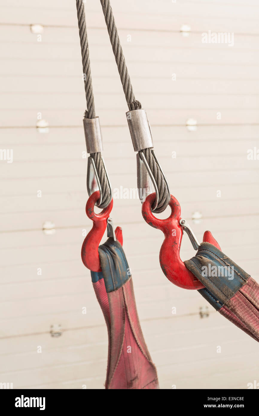 Close-up of pulley and rope against wooden wall Stock Photo - Alamy