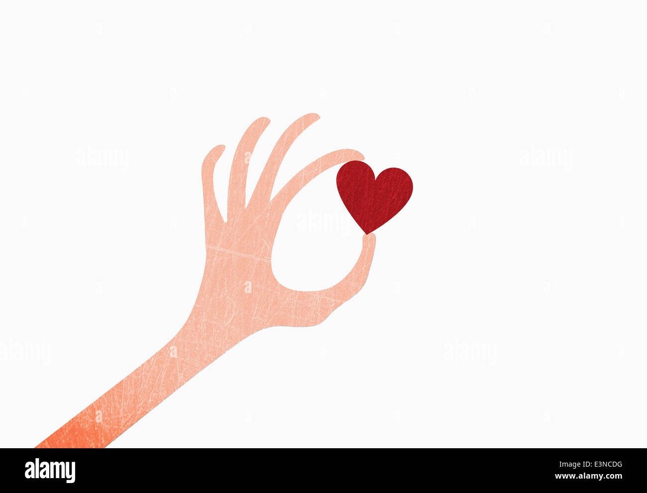 A hand holding heart shape against white background Stock Photo - Alamy
