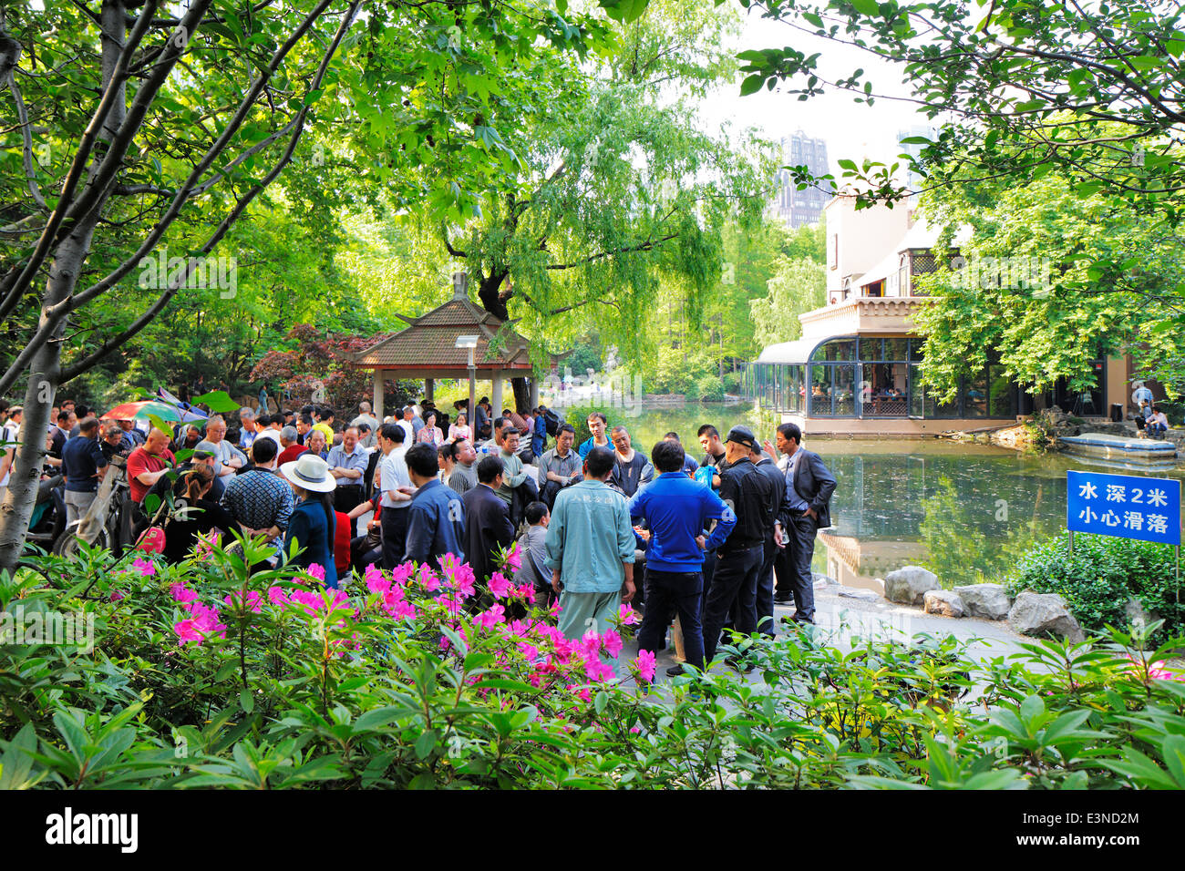 People's Park, Shanghai, China. Locals and visitors enjoy the peace and ...
