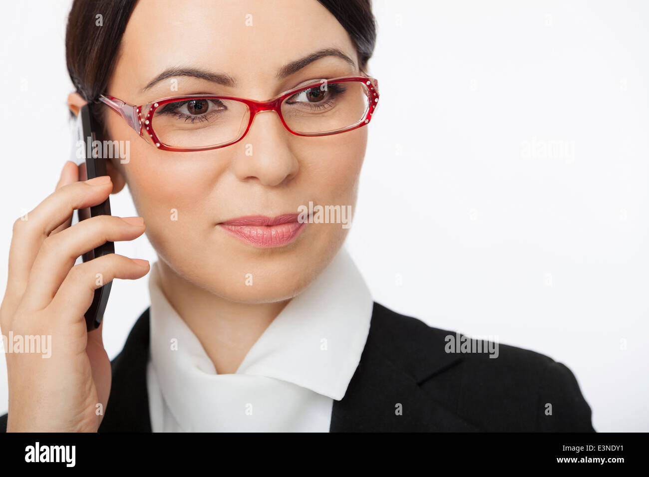 Woman talking over cellphone Stock Photo - Alamy