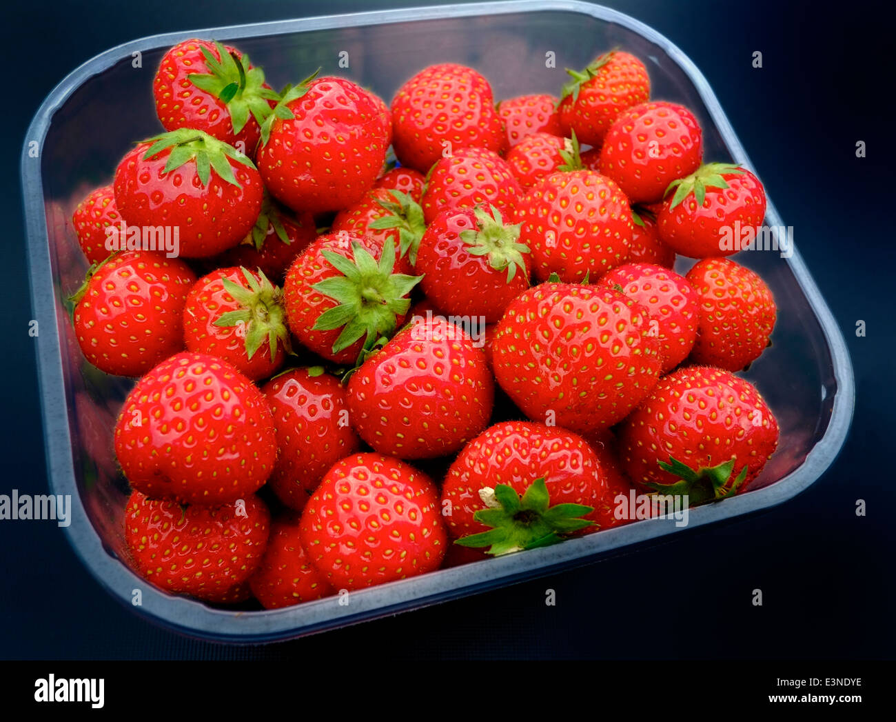 A plastic punnet of English strawberries Stock Photo - Alamy