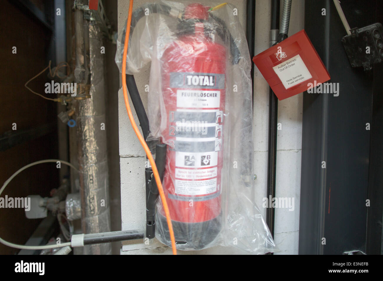 Berlin, Germany. 23rd June, 2014. A fire extinguisher and a fire alarm ...