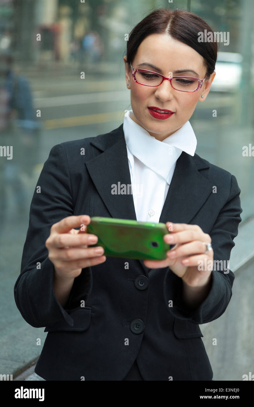 business woman reading a text message Stock Photo - Alamy
