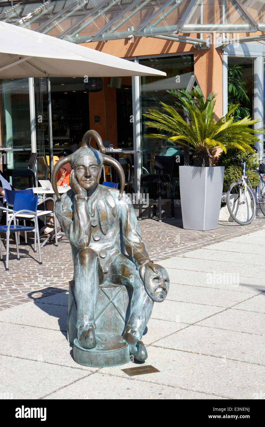 Bronze statue of a Harlequin figure in Villach, Austria Stock Photo - Alamy