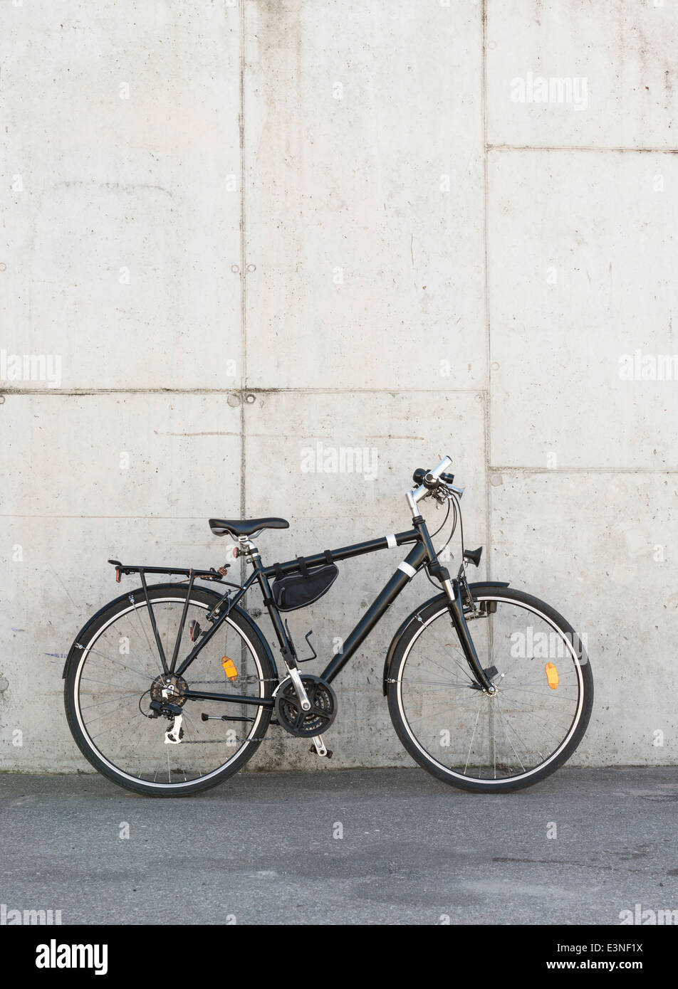 Bike against wall Stock Photo - Alamy