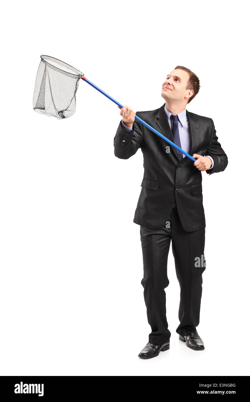Full length portrait of a businessman holding a net Stock Photo - Alamy