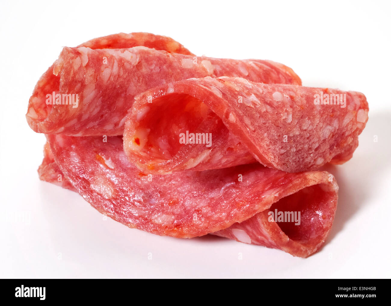 Rolls of sliced salami Stock Photo - Alamy