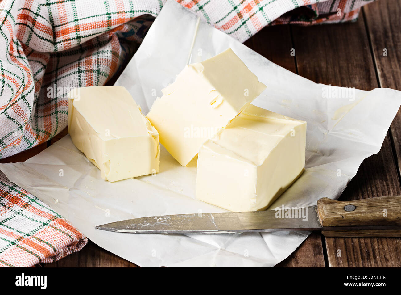 Still life butter on wooden background Stock Photo - Alamy
