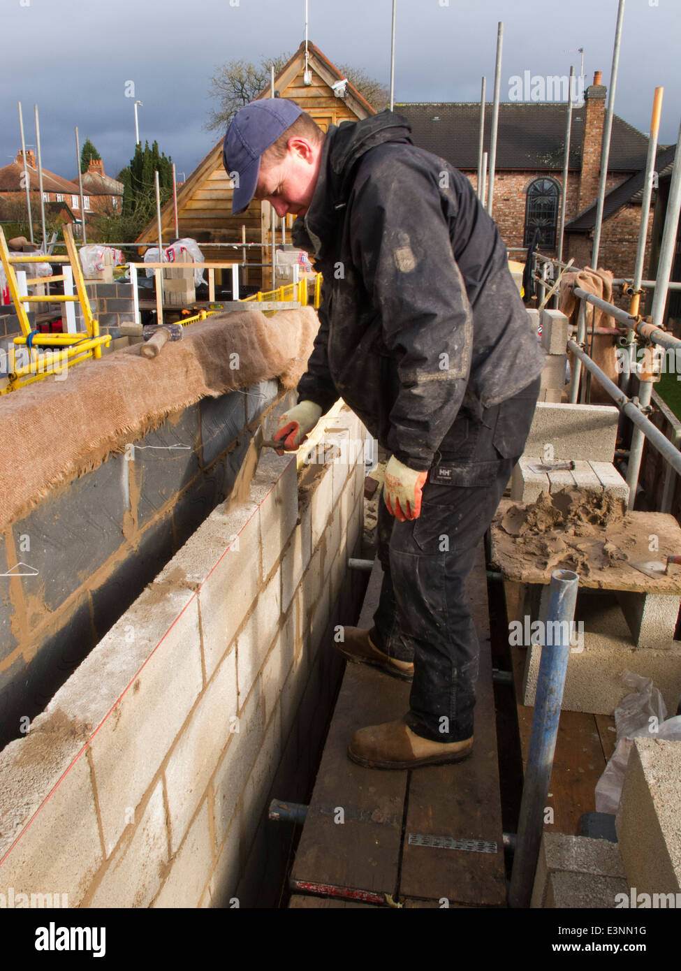 Bricklayer on scaffolding High Resolution Stock Photography and Images ...