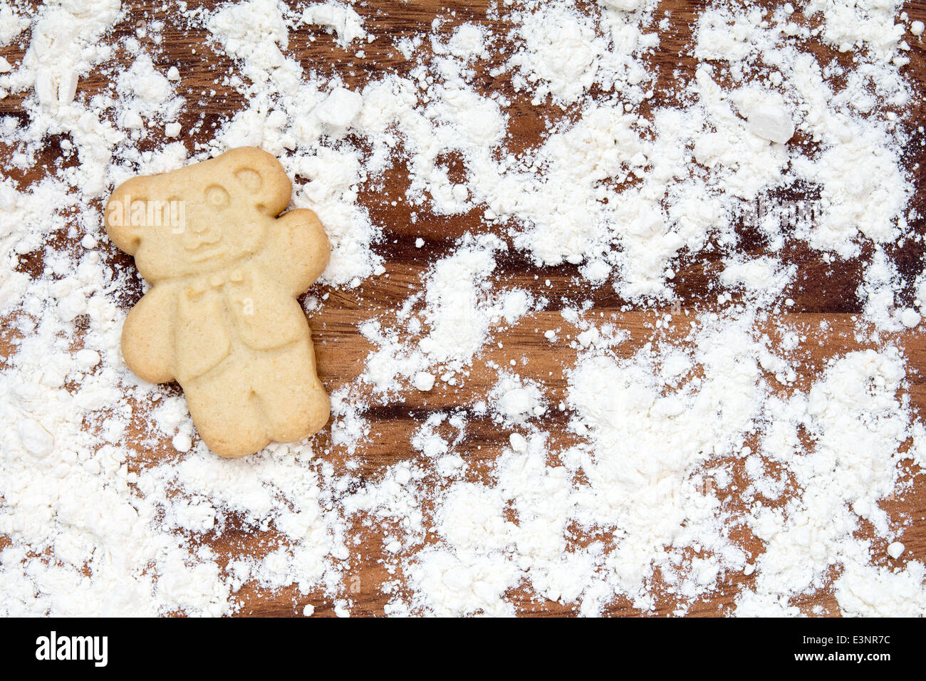 Cookie bear with flour on a cutting board Stock Photo - Alamy