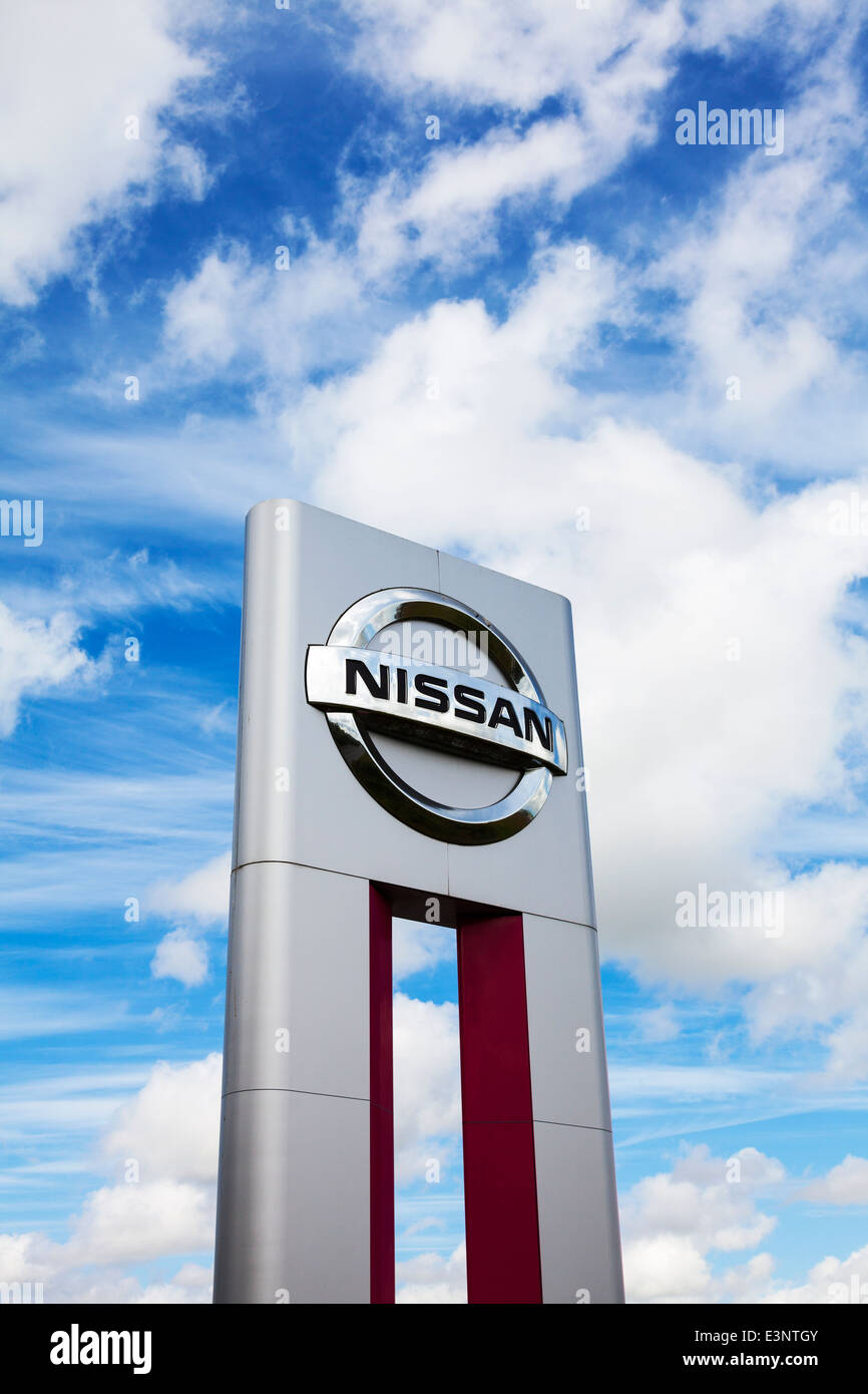 Nissan car garage sign emblem logo icon copy space against dramatic sky ...