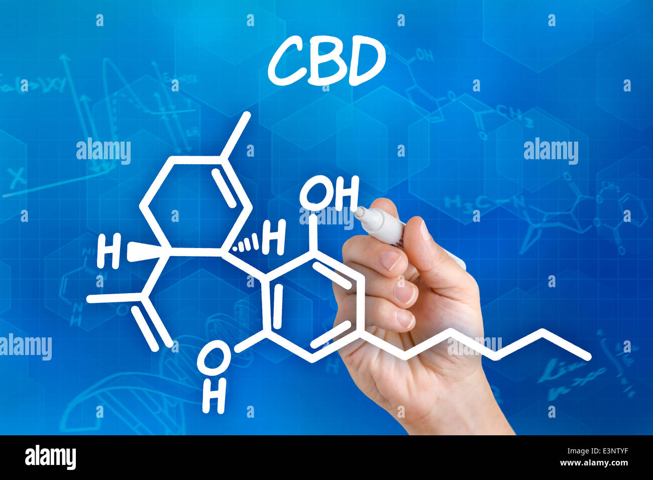 Hand with pen drawing the chemical formula of CBD Stock Photo - Alamy