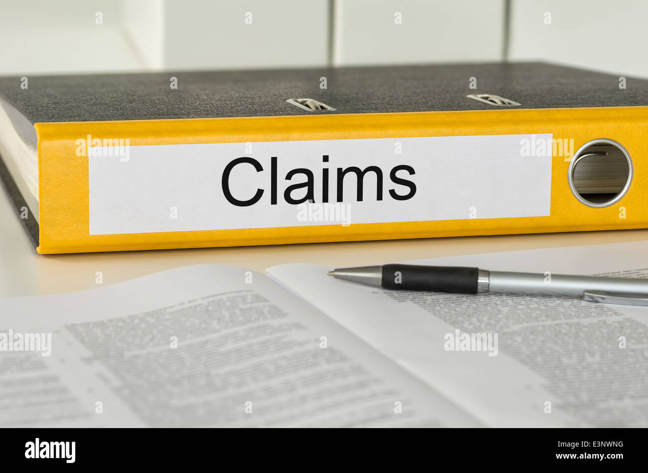 Folder with the label Claims Stock Photo - Alamy