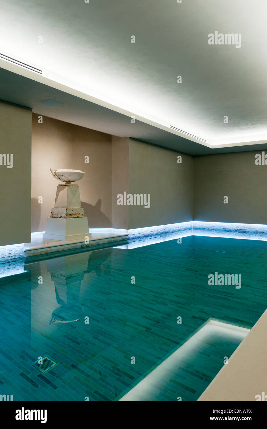 Urn on plinth in alcove in indoor swimming pool Stock Photo - Alamy