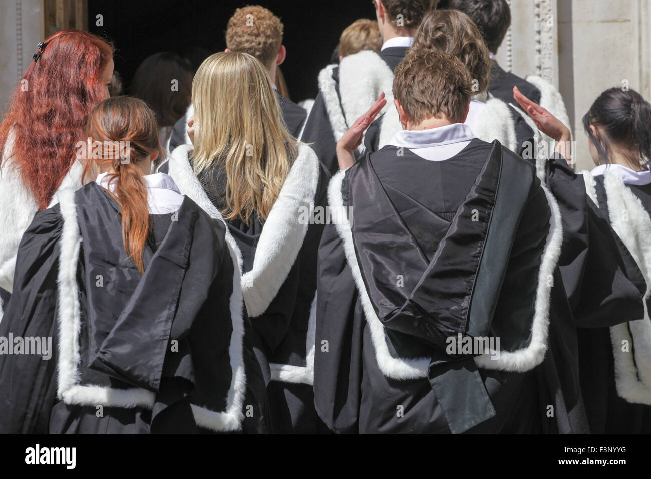 Cambridge University students on Graduation Day receiving their degrees ...