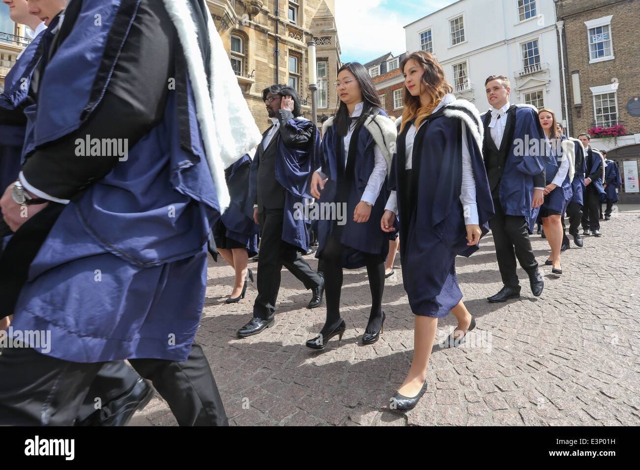 Cambridge University students on Graduation Day receiving their degrees ...