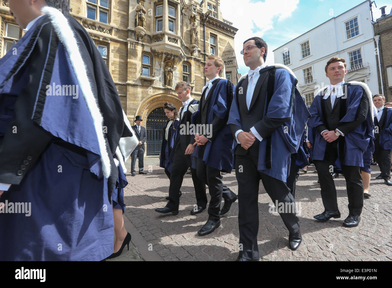 Cambridge University students on Graduation Day receiving their degrees ...