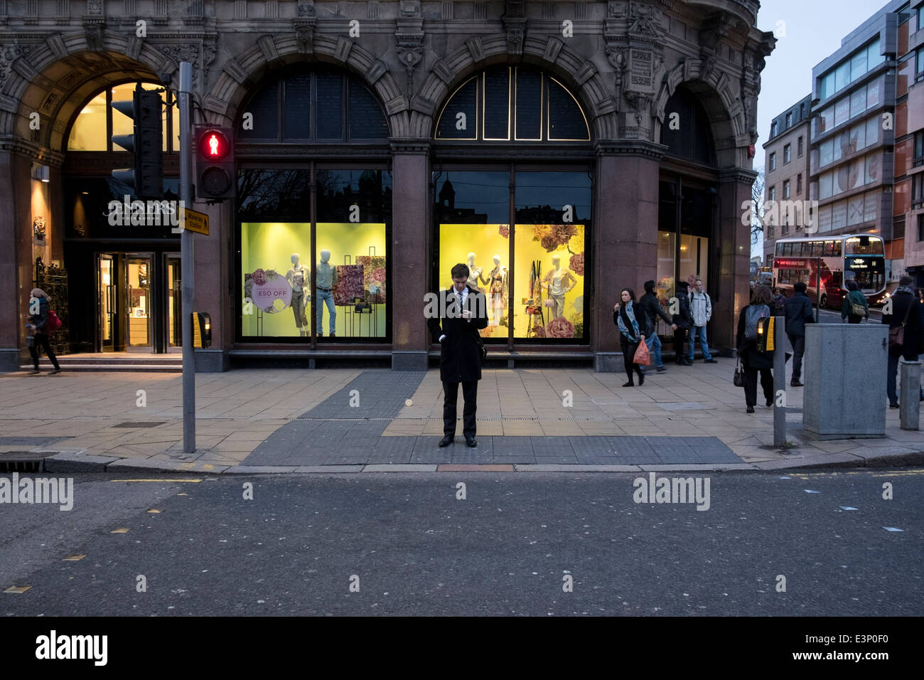 A man waits the traffic light in Prince street, Edinburgh Stock Photo ...