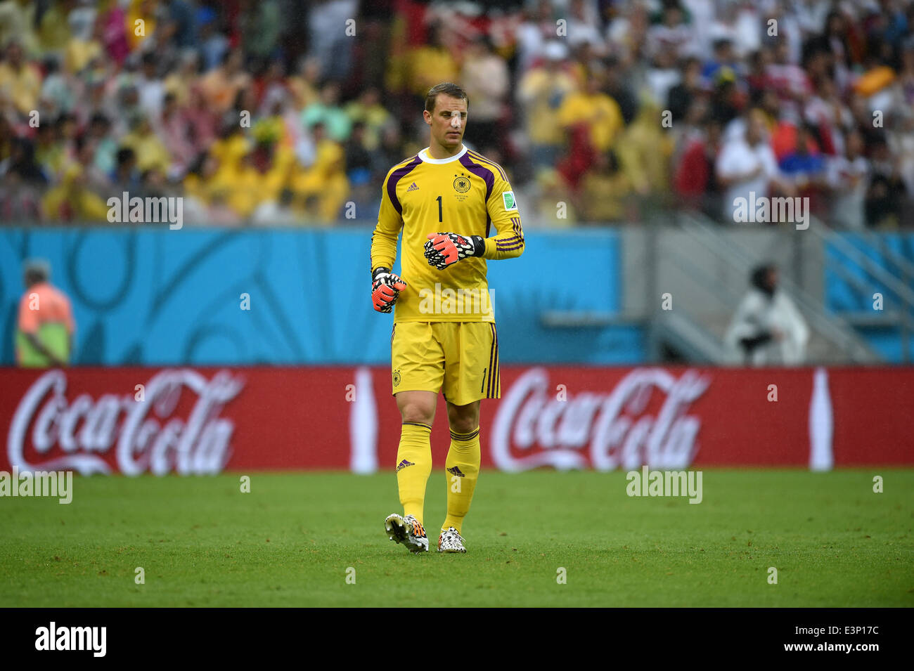 Recife, Brazil. 26th June, 2014. German goal keeper Manuel Neuer walks ...