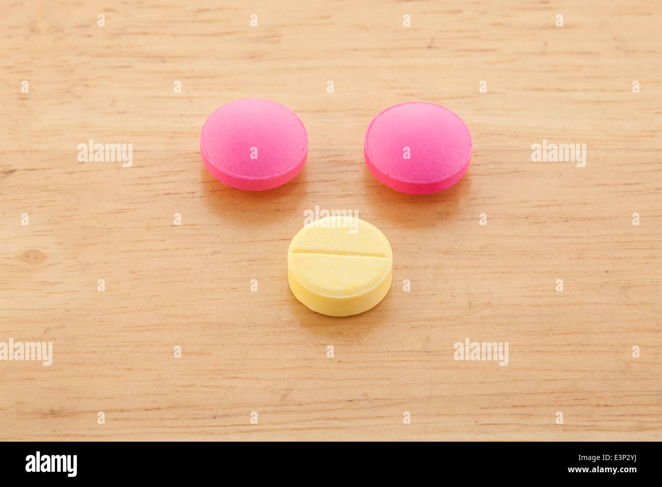 many colorful pills on a white background. symbolic photo for medicine ...